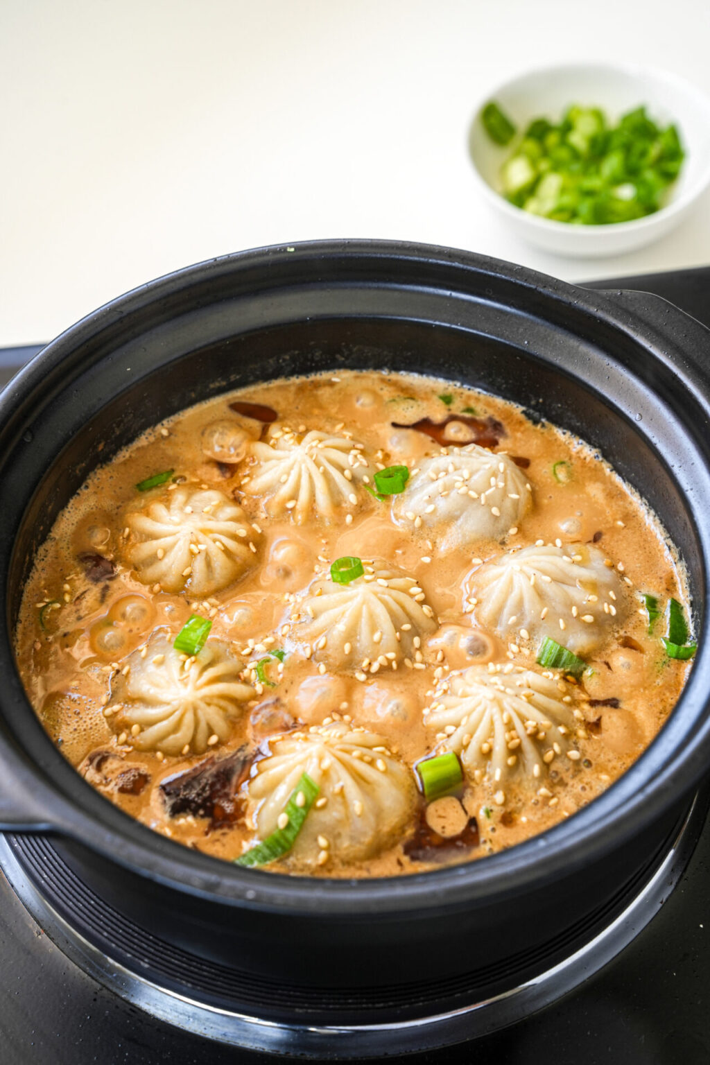 Soup Dumplings in Sesame Peanut Sauce - One Happy Bite